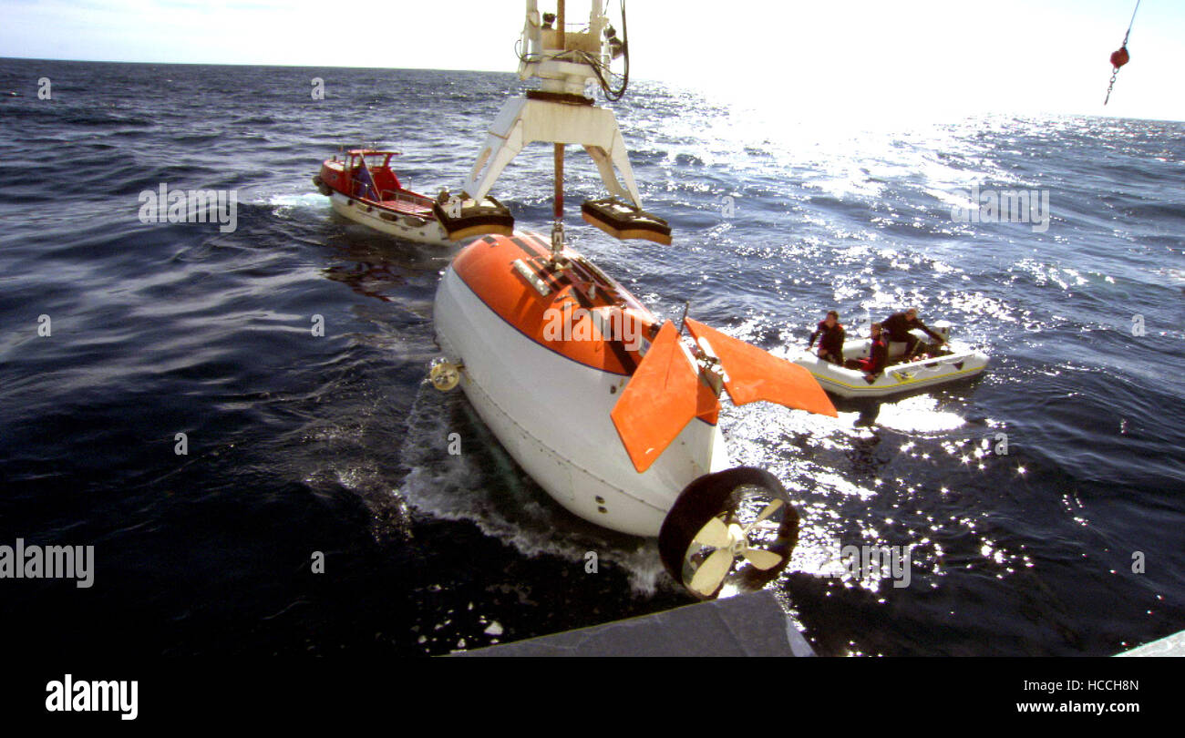 GHOSTS OF THE ABYSS, a MIR submersible is lowered from the Keldysh ...