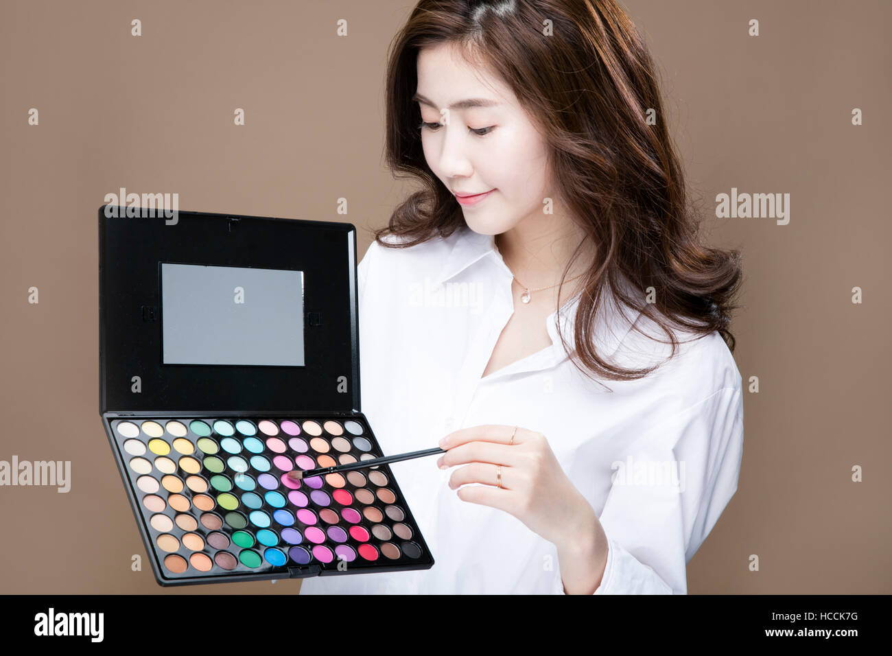 Person using makeup hi-res stock photography and images - Alamy
