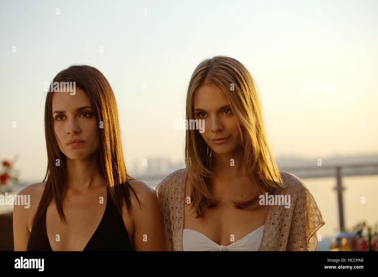 EVIDENCE, from left: Torrey DeVitto, Caitlin Stasey, 2013. ph: Daniel C ...
