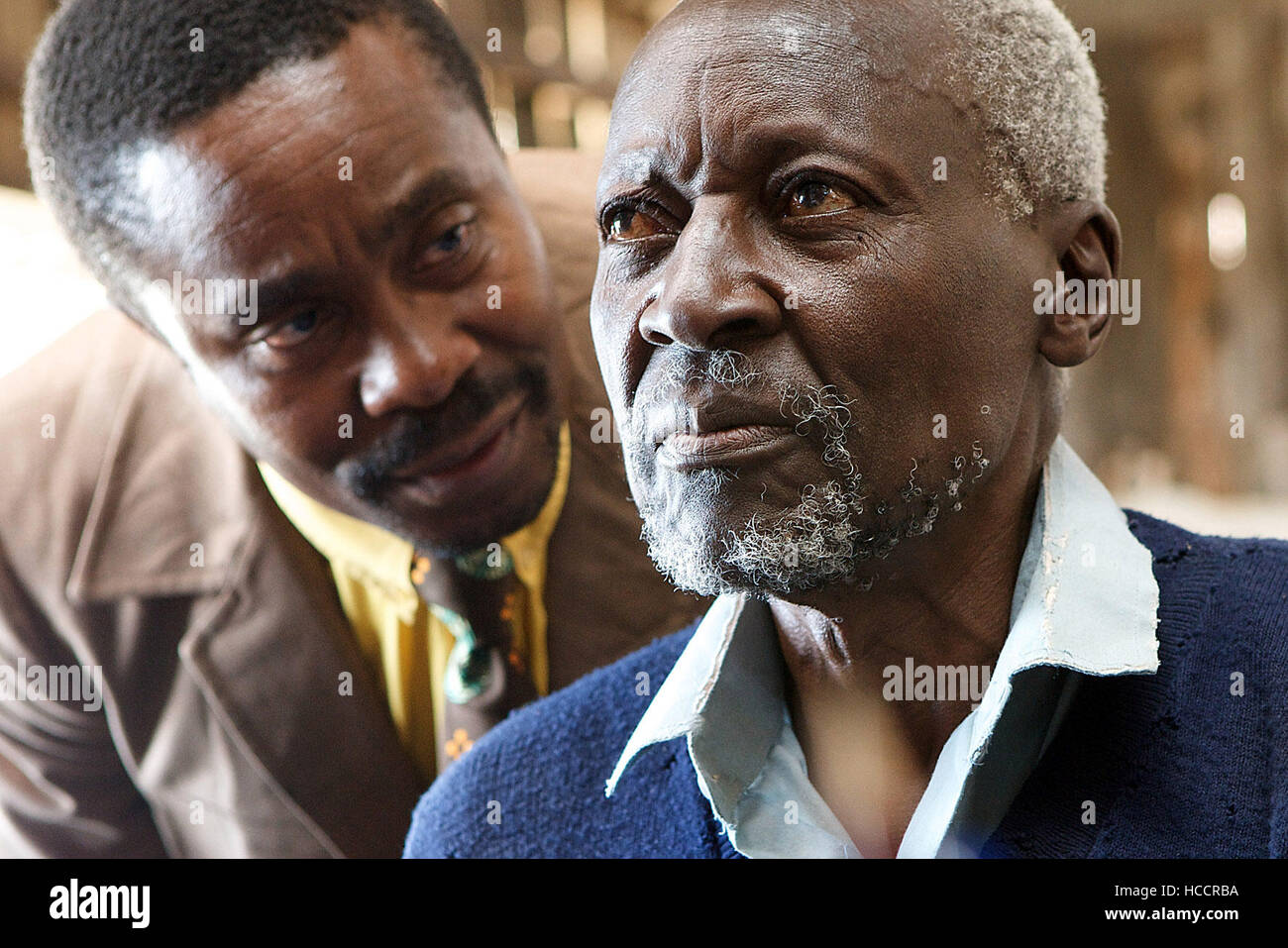 THE FIRST GRADER, from left: Vusi Kunene, Oliver Litondo, 2010. ph ...