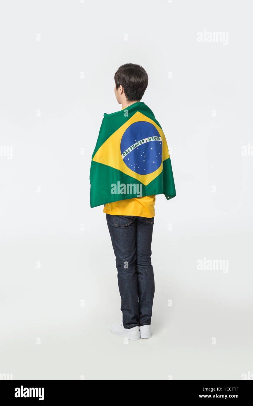 Back of young man with flag Stock Photo - Alamy