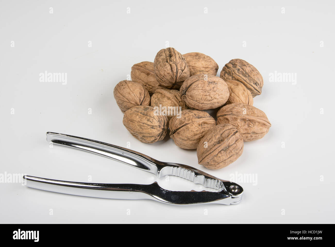 crack a nut Stock Photo - Alamy