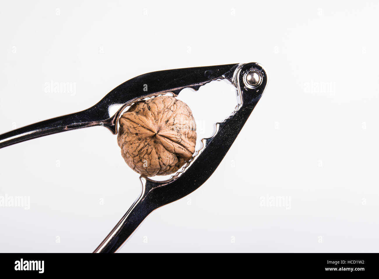 crack a nut Stock Photo - Alamy