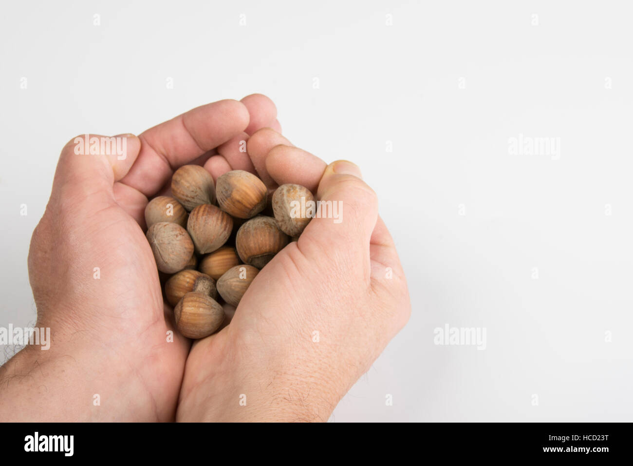 the nuts on the hands Stock Photo - Alamy