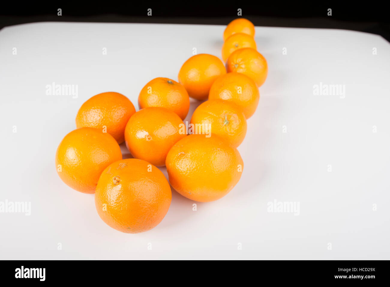 Orange fruits on the table Stock Photo - Alamy