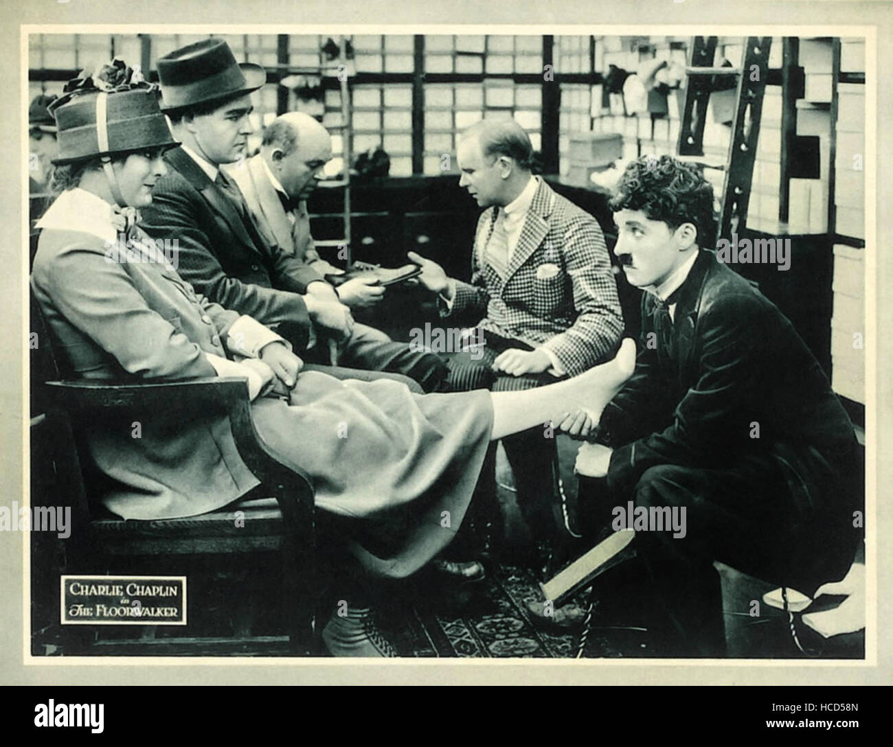 THE FLOORWALKER, right: Charlie Chaplin on lobbycard, 1916 Stock Photo ...