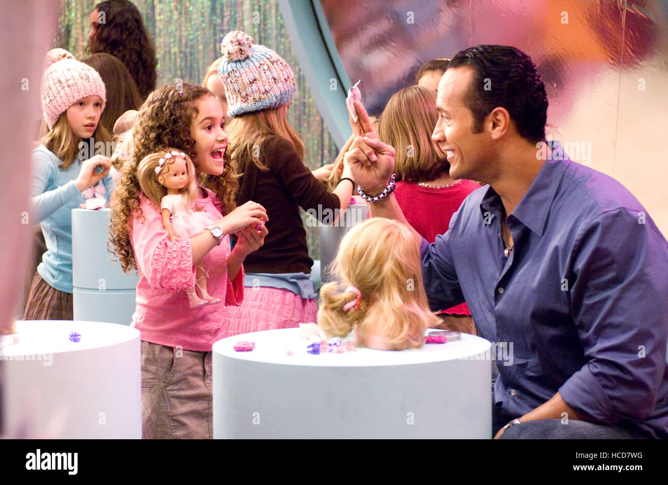 THE GAME PLAN, foreground: Madison Pettis, Dwayne Johnson, 2007. ©Buena ...