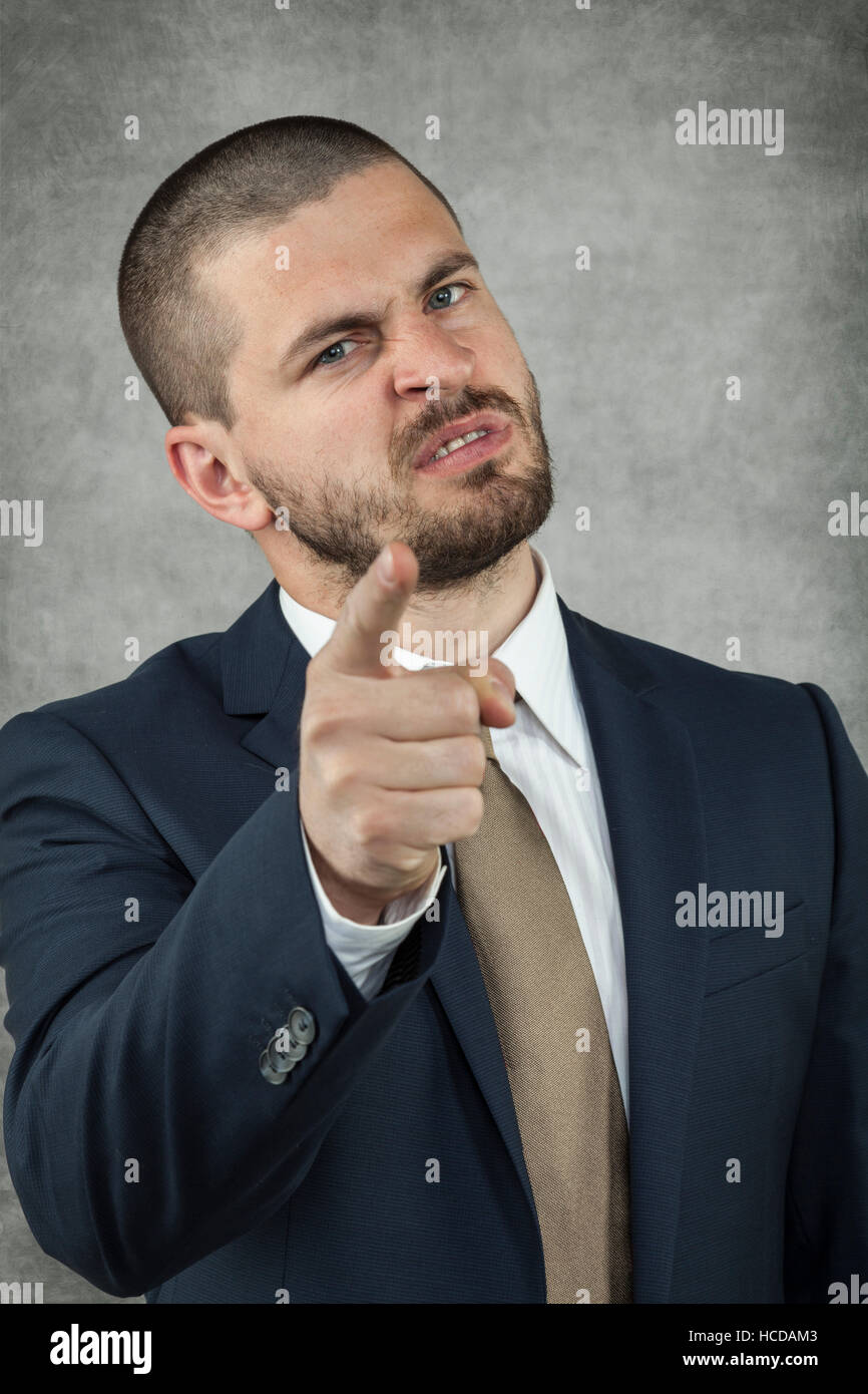 Angry Businessman pointing at you Stock Photo - Alamy