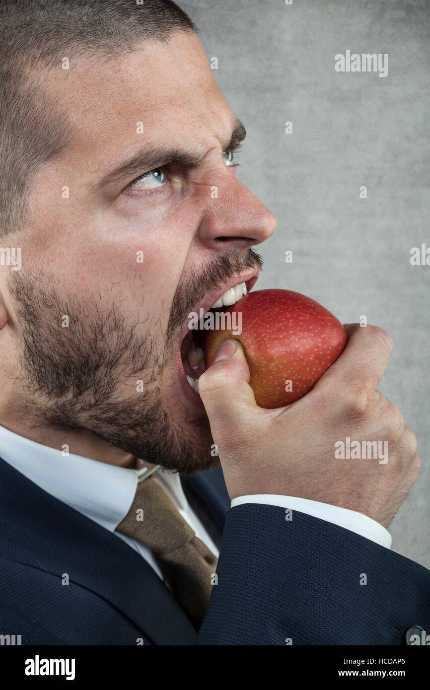 Eating apple angry hi-res stock photography and images - Alamy