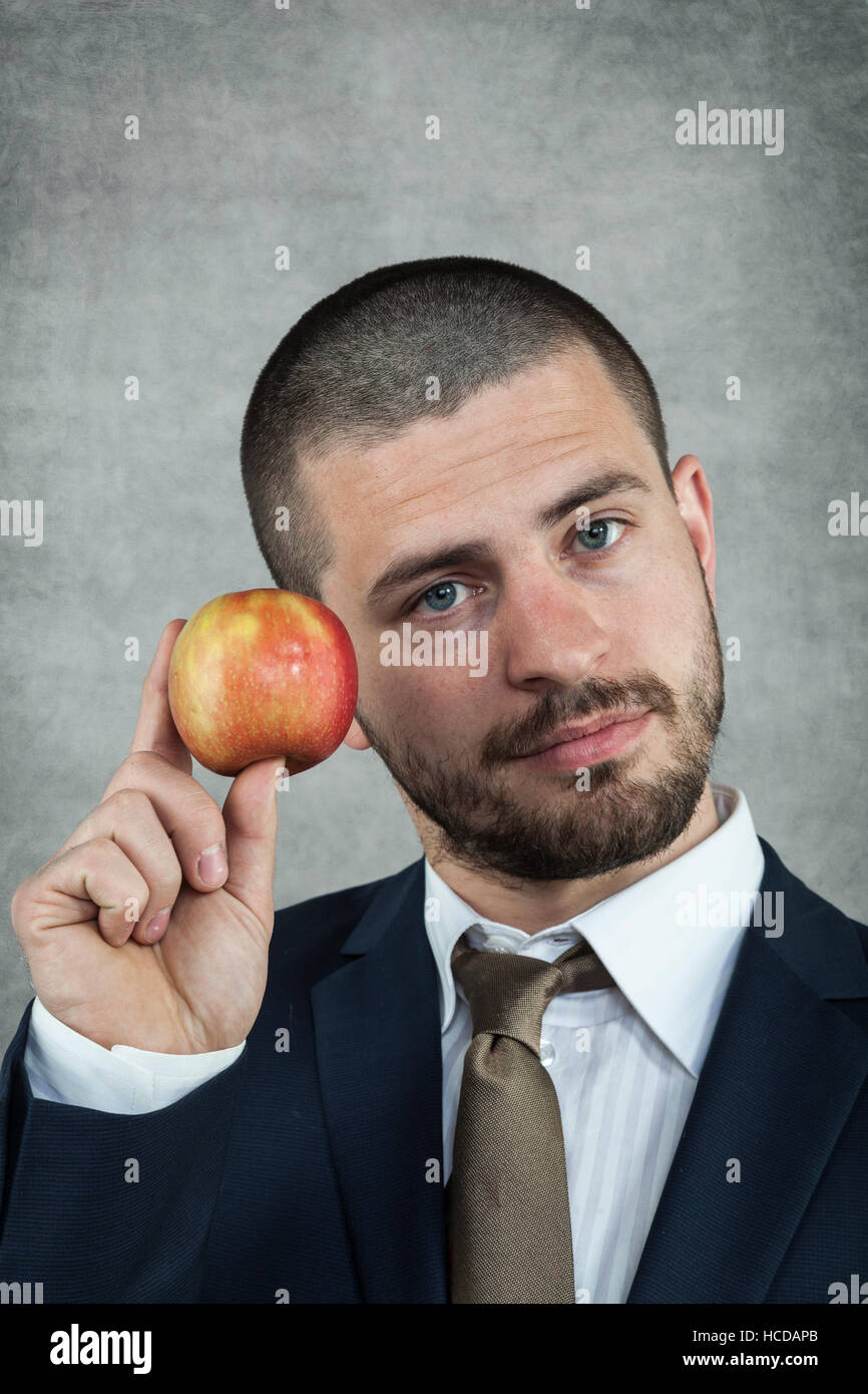 Portrait Man Apple In Mouth High Resolution Stock Photography and ...