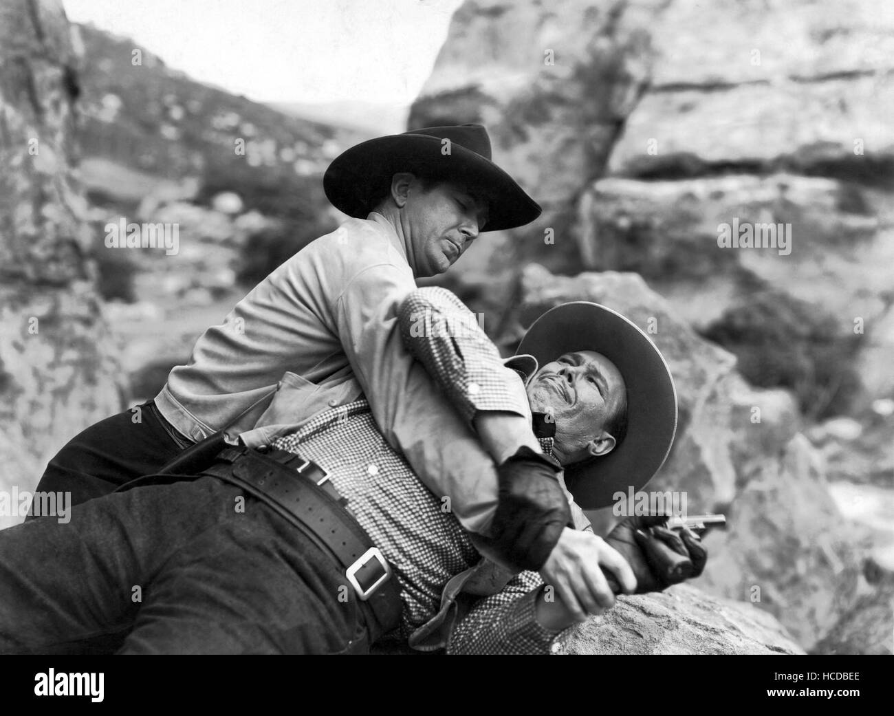 GUNS IN THE DARK, top to bottom: Johnny Mack Brown, Dick Curtis, 1937 Stock Photo - Alamy