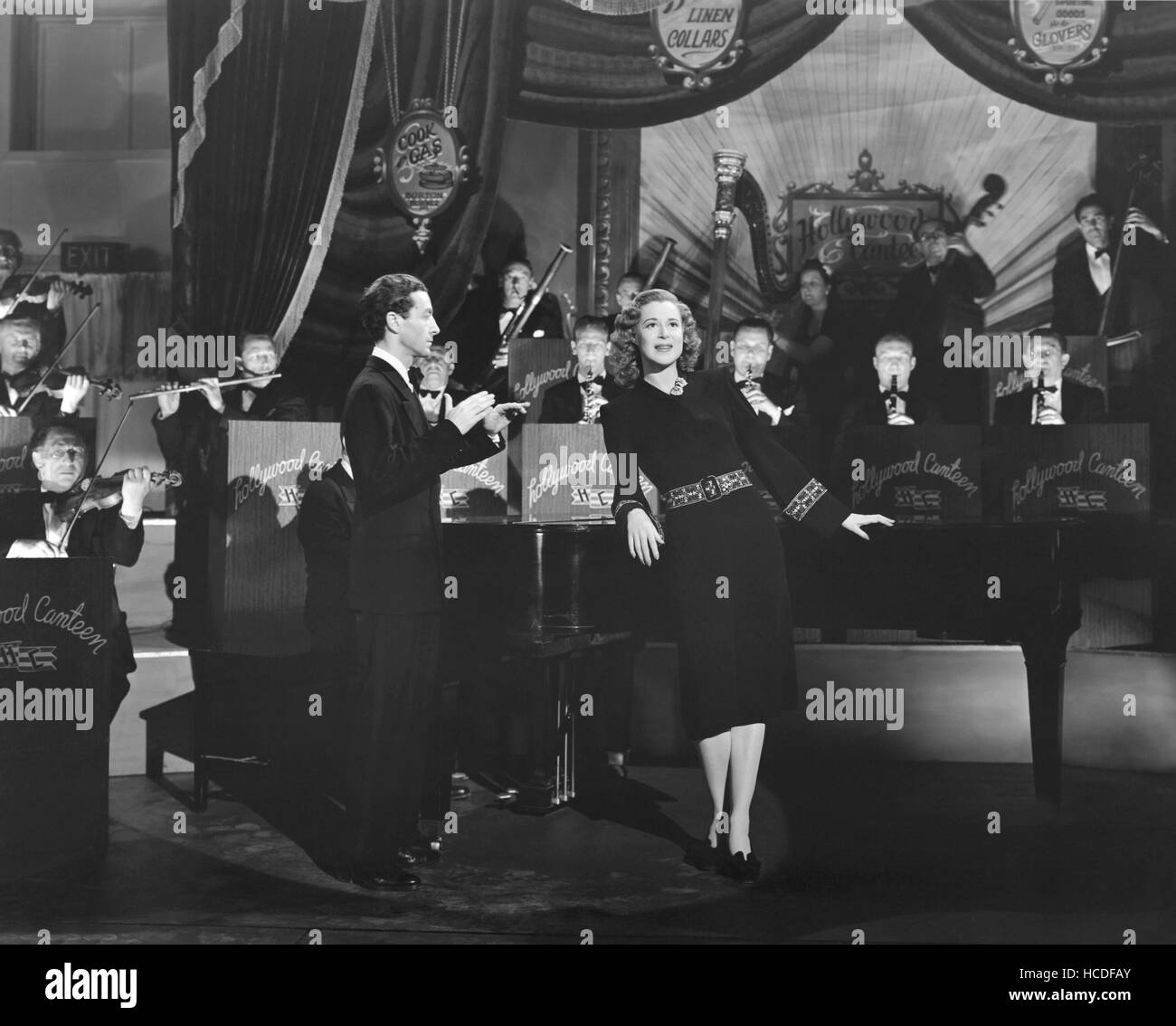 HOLLYWOOD CANTEEN, Rudolf Friml Jr. (conducting), Kitty Carlisle ...
