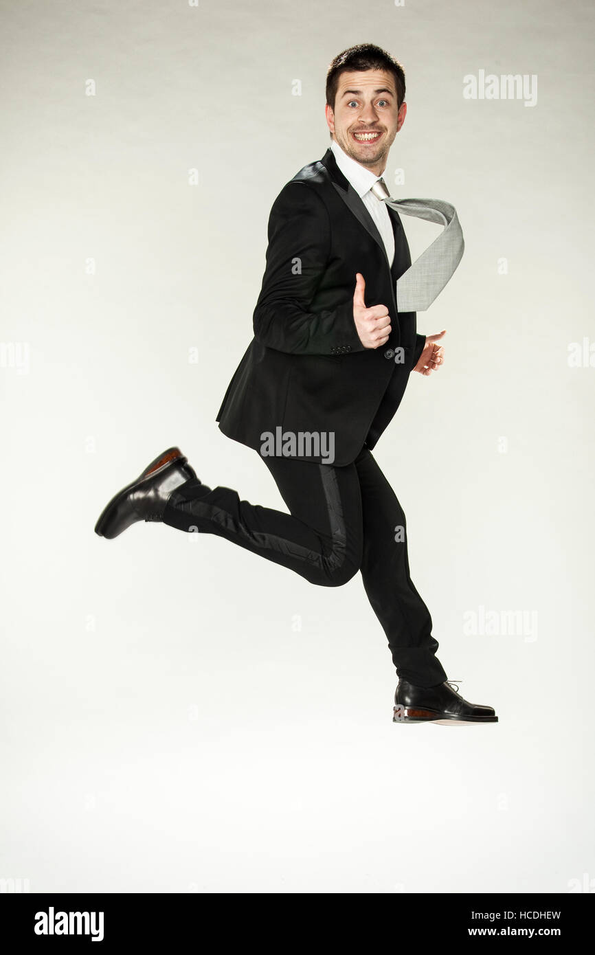 happy running businessman Stock Photo - Alamy