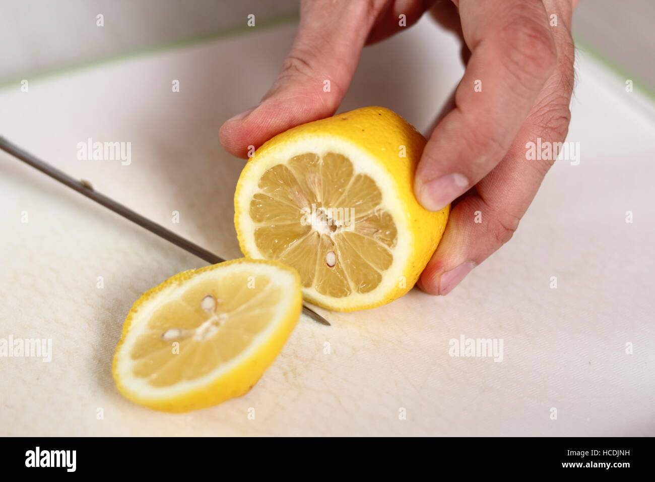 Cutting top of lemon. Making Apple Tarte Tatin with Cinnamon Series ...