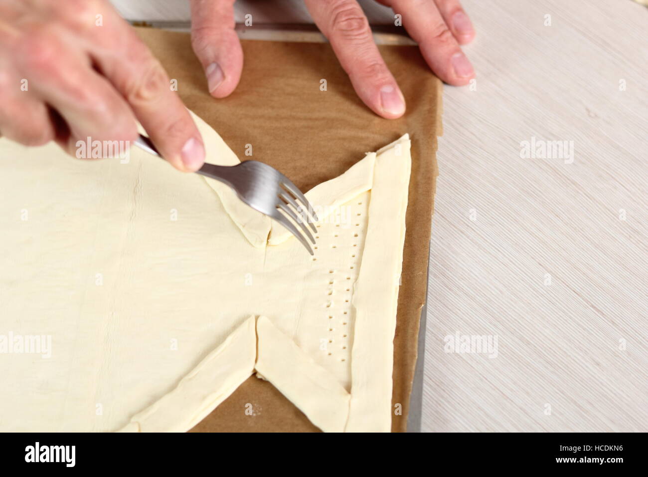 Prick Puff Pastry Base with Fork. Making Salmon in Puff Pastry Series ...