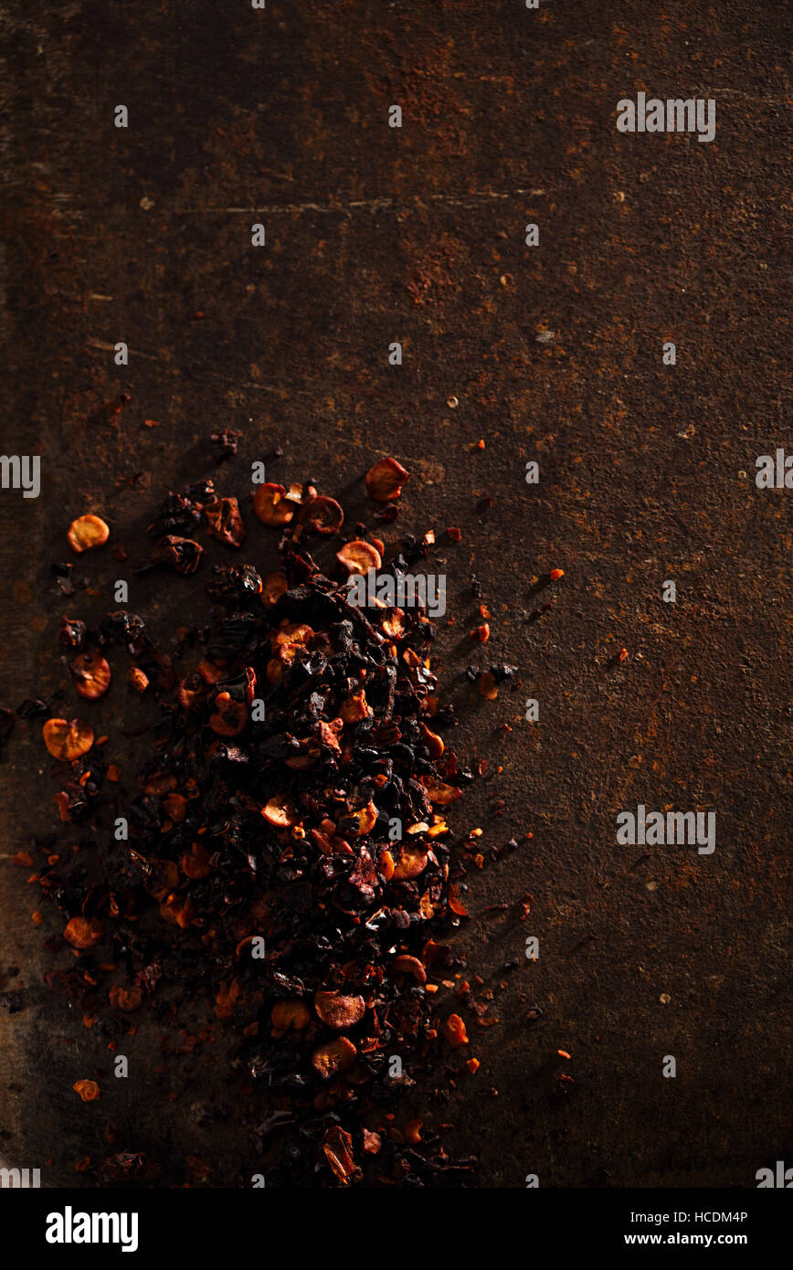 chipotle - jalapeno smoked chili flakes on old textured metal Stock ...