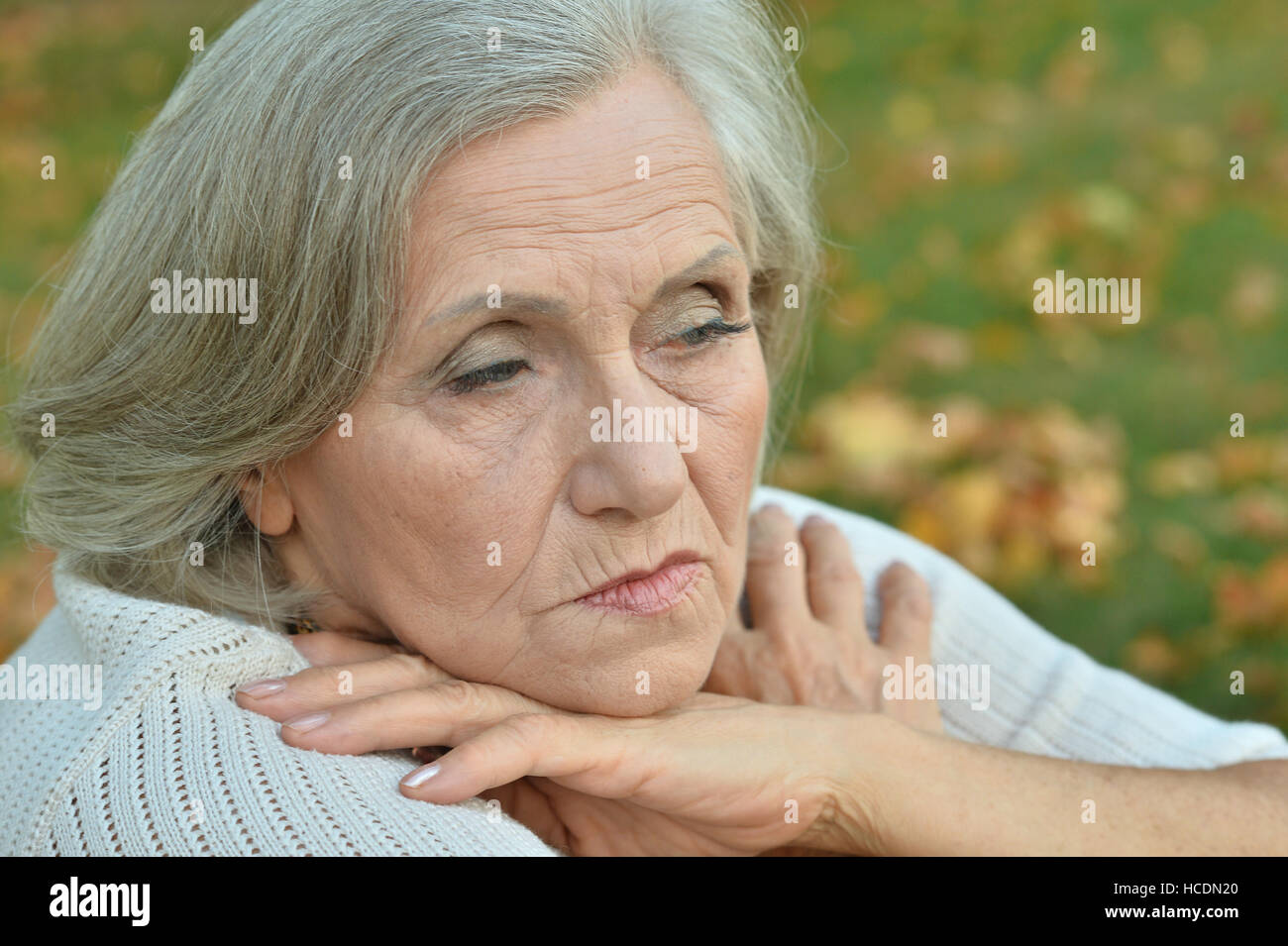 Nice sad old woman Stock Photo - Alamy