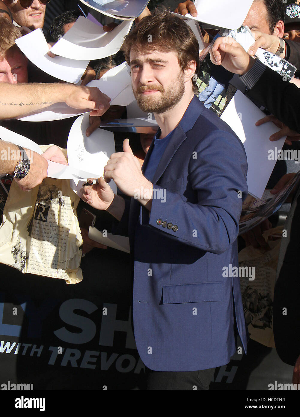 Daniel Radcliffe signs autographs for fans outside 'The Daily Show with ...