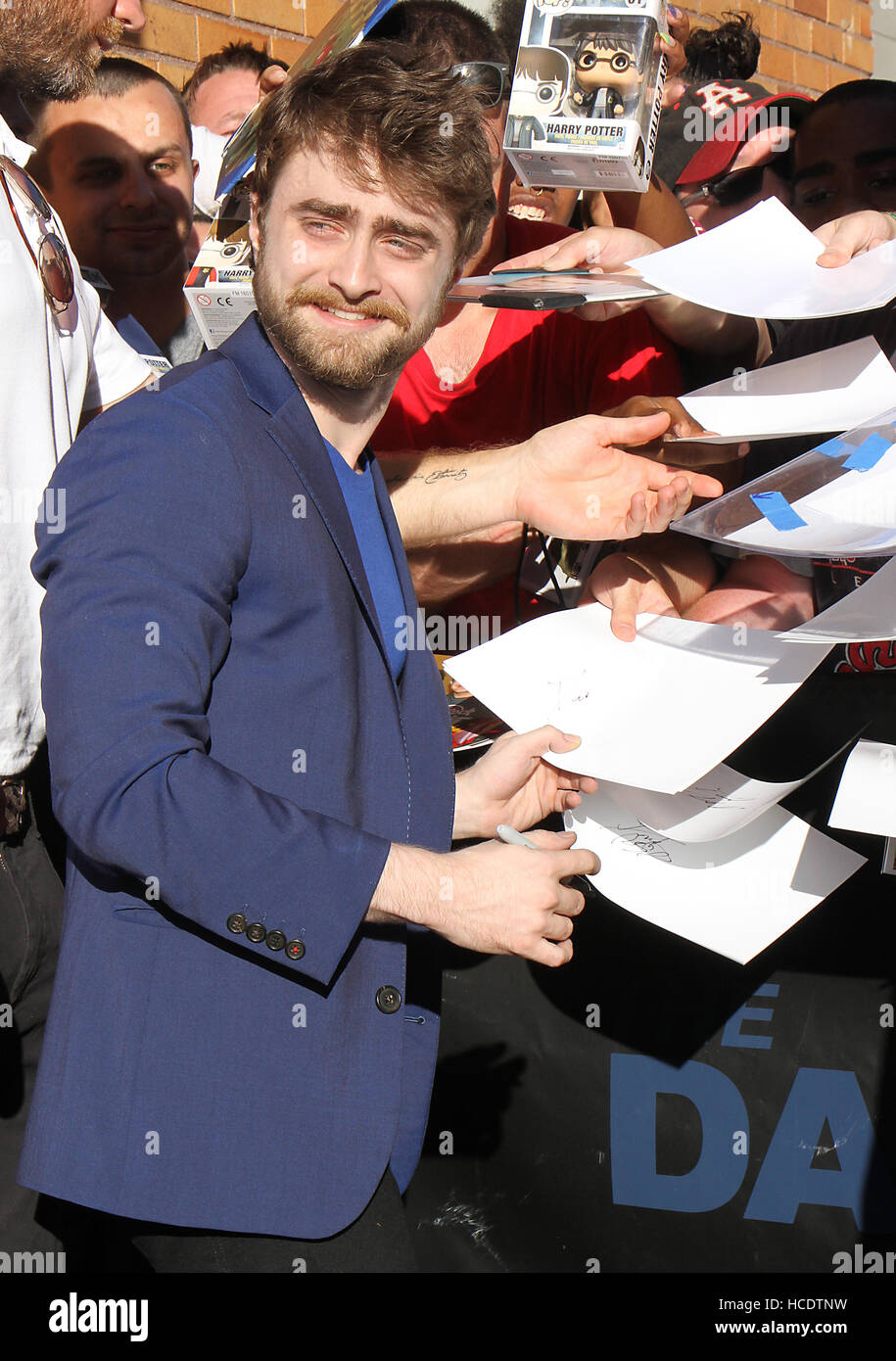 Daniel Radcliffe signs autographs for fans outside 'The Daily Show with ...