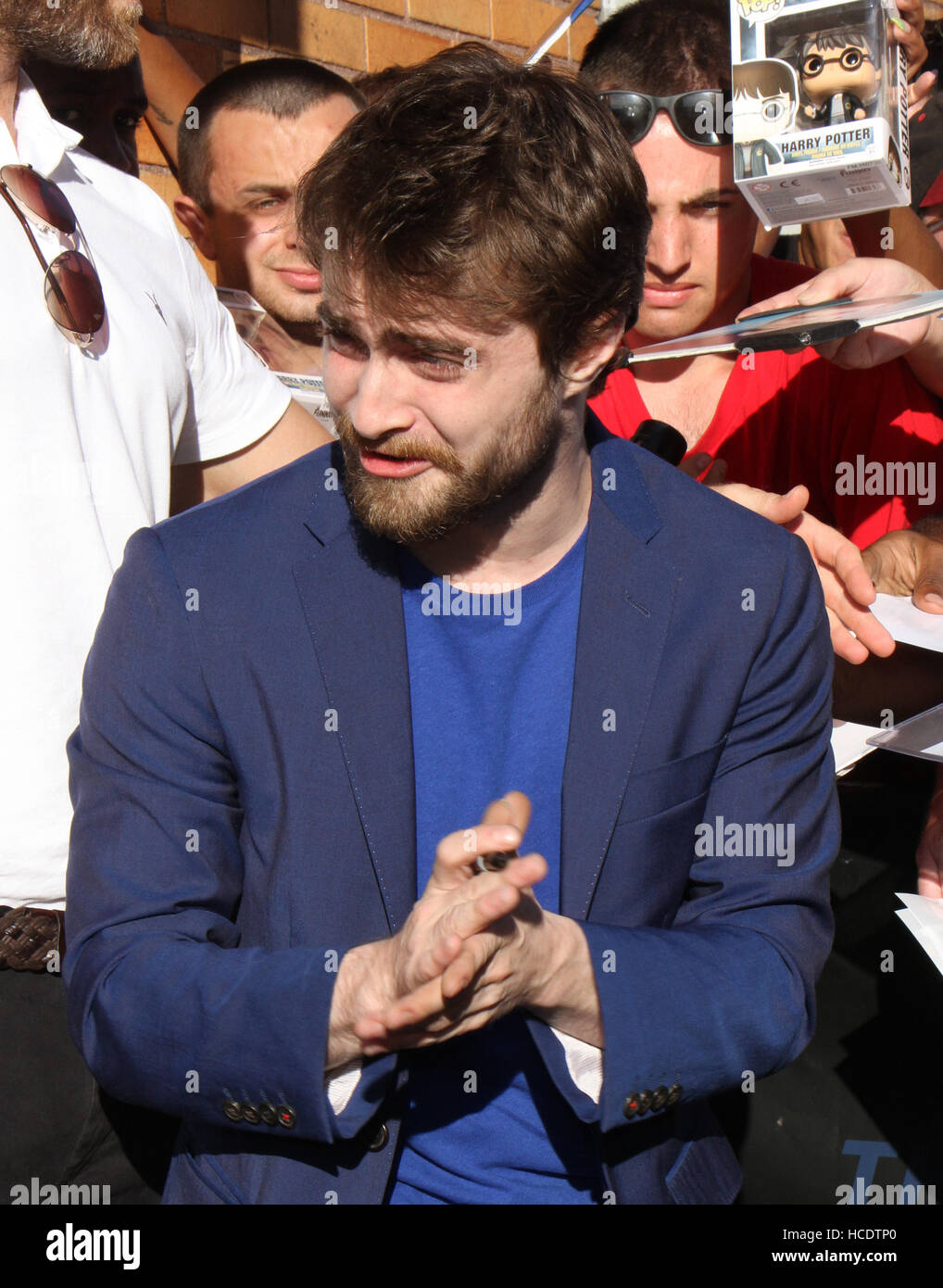 Daniel Radcliffe signs autographs for fans outside 'The Daily Show with ...