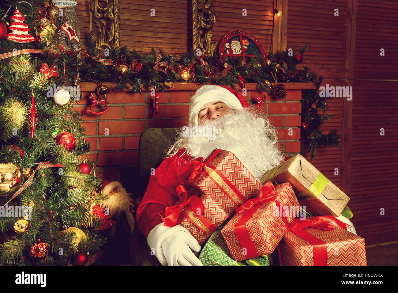 Real Santa Claus. Santa Claus sleeping in the living room near the ...