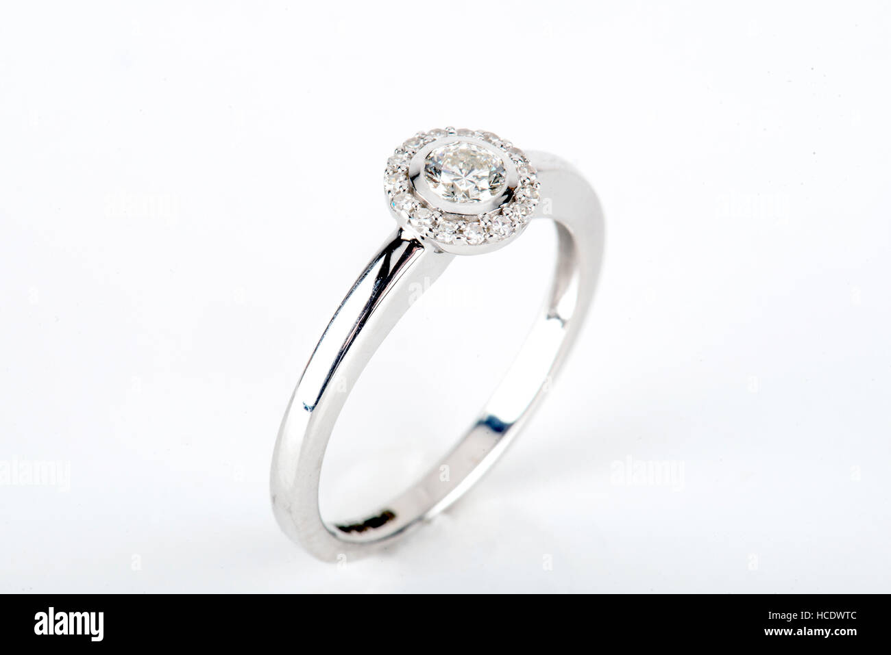 Diamond ring with gold and silver and precious stones. Shot standing up ...