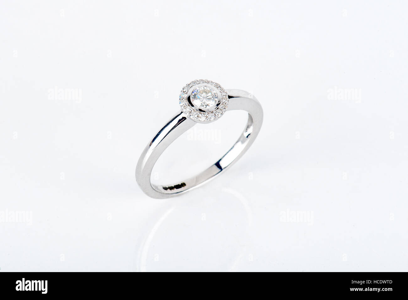 Diamond ring with gold and silver and precious stones. Shot standing up ...