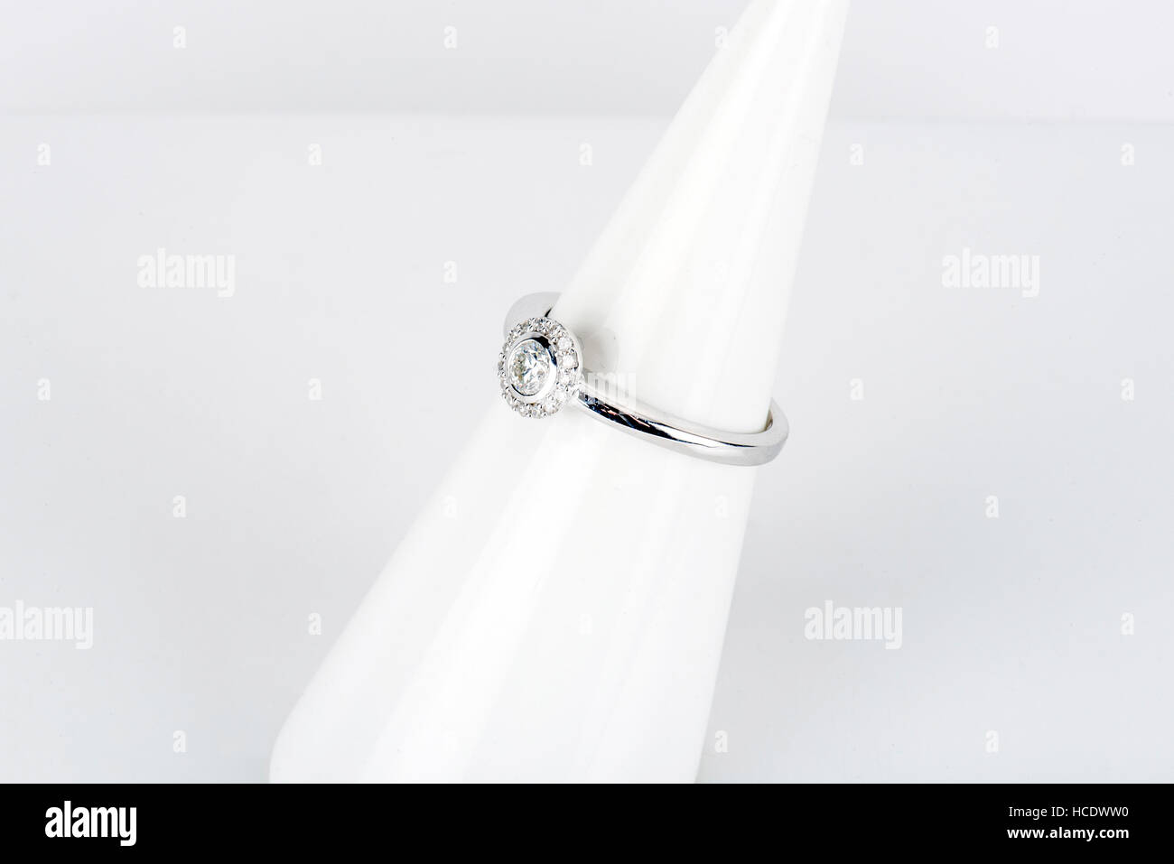 Diamond ring with gold and silver and precious stones. Shot standing up ...