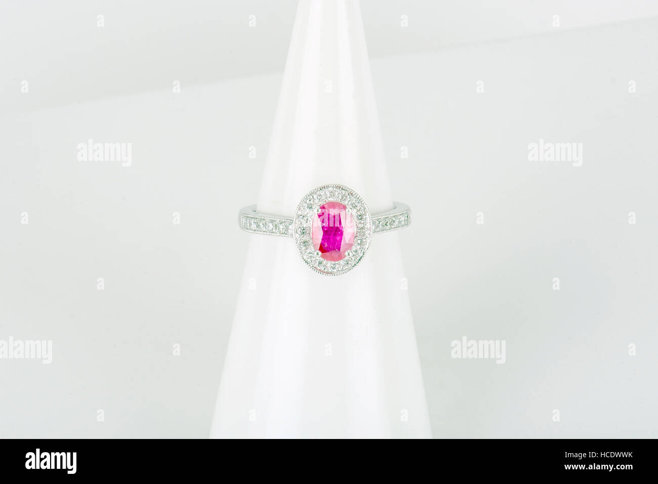 Diamond ring with gold and silver and precious stones. Shot standing up ...