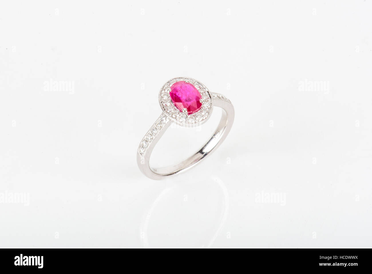 Diamond ring with gold and silver and precious stones. Shot standing up ...