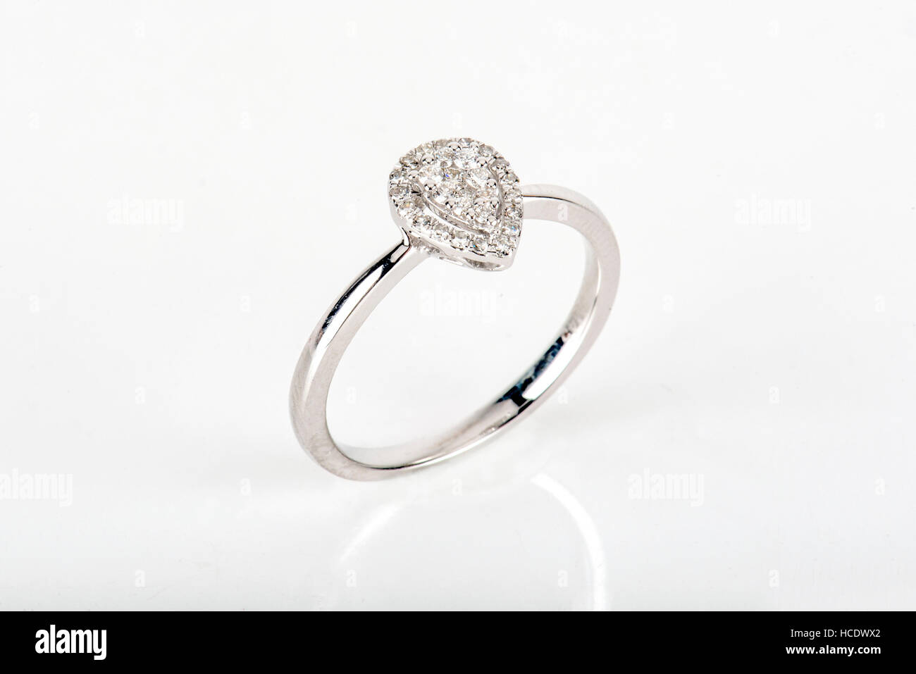 Diamond ring with gold and silver and precious stones. Shot standing up ...