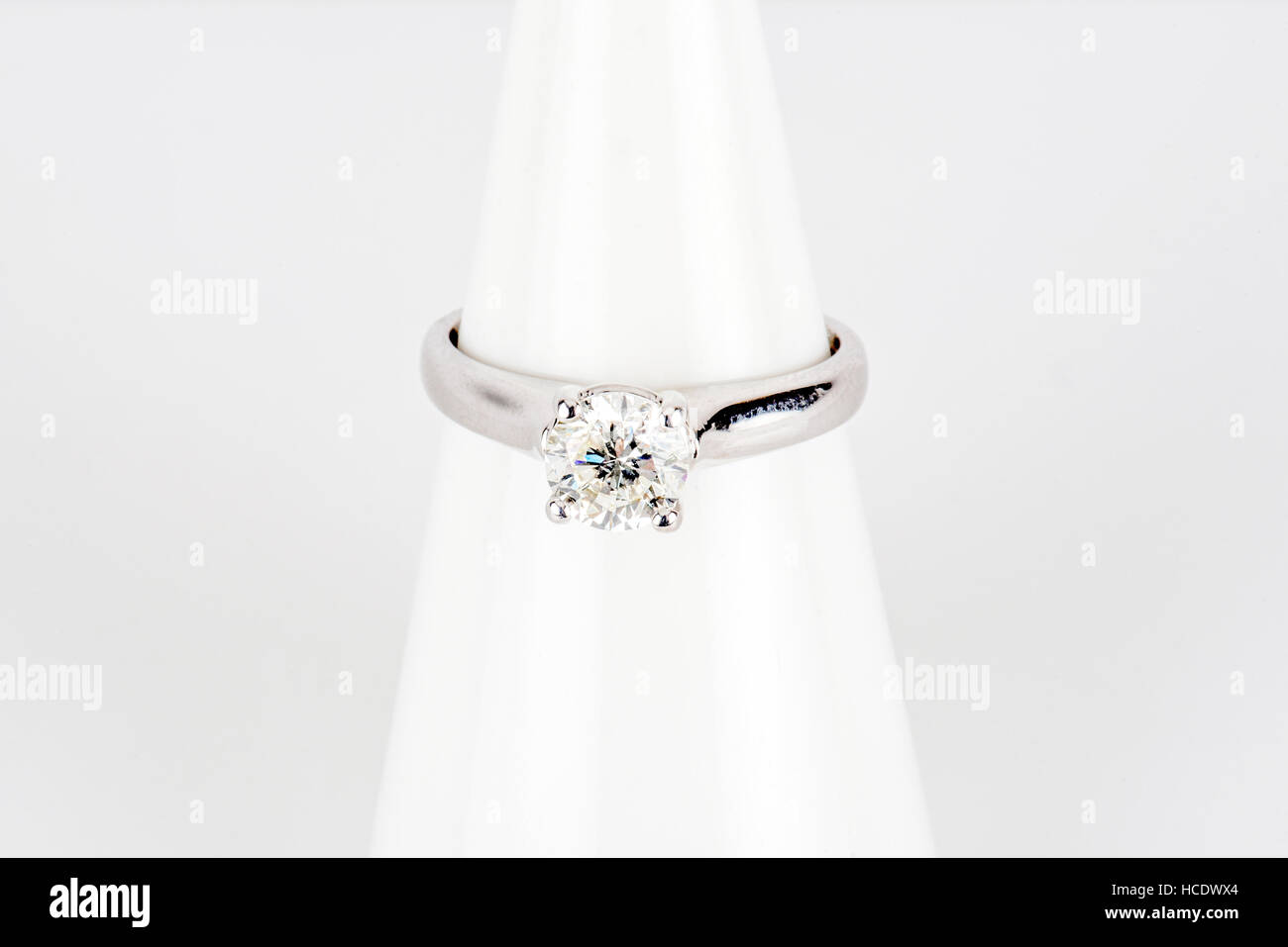 Diamond ring with gold and silver and precious stones. Shot standing up ...
