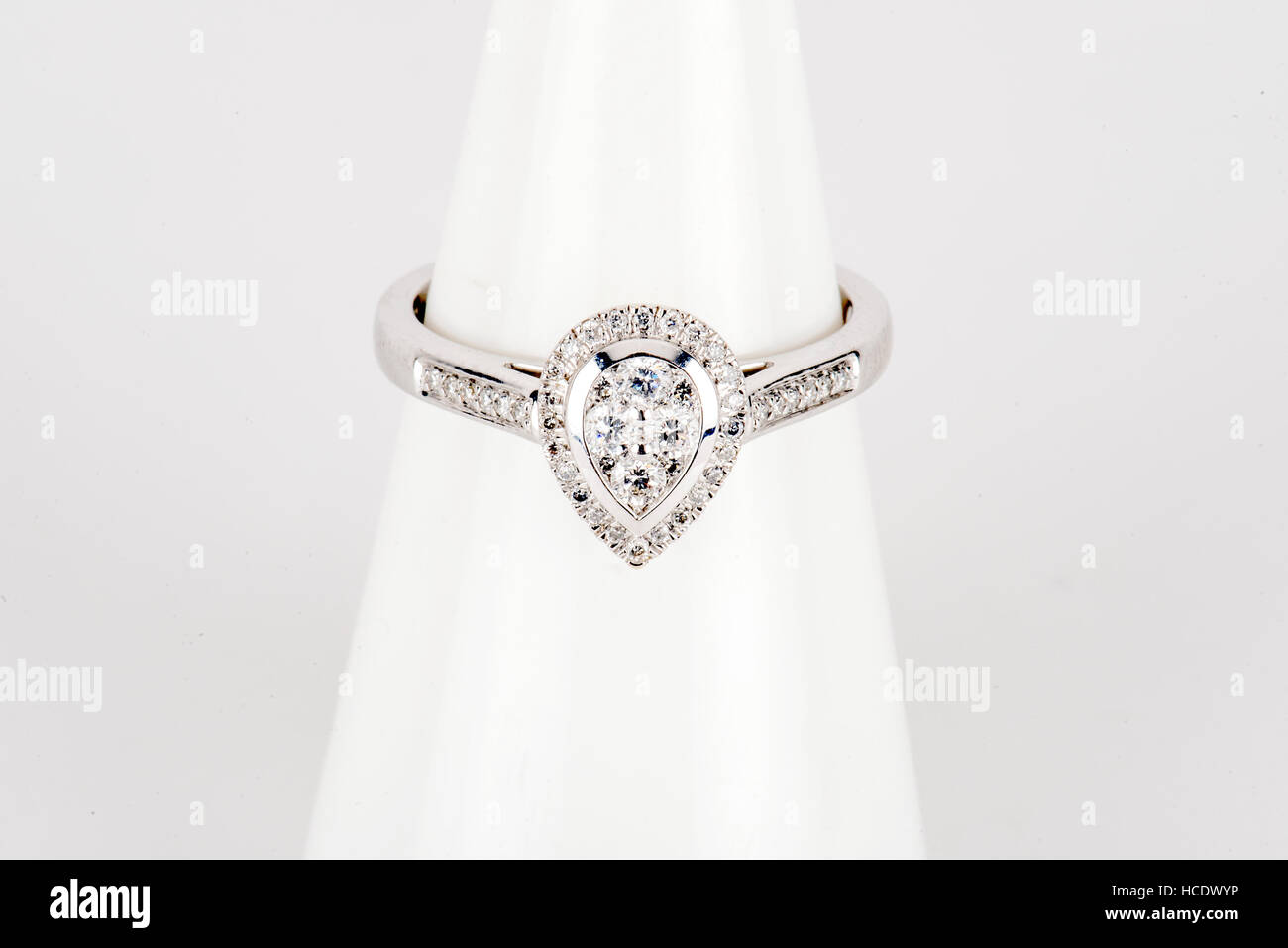 Diamond ring with gold and silver and precious stones. Shot standing up ...