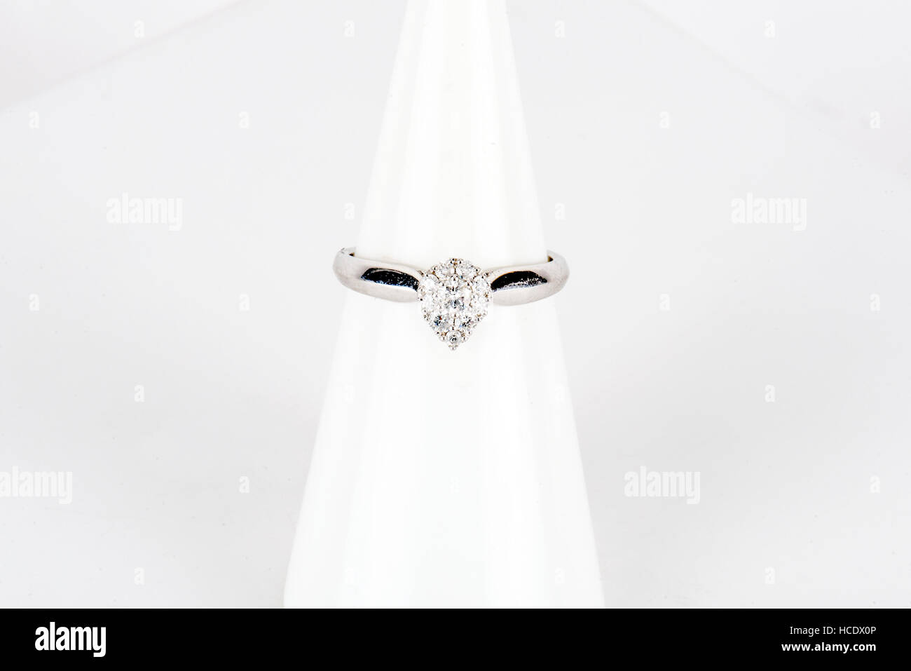 Diamond ring with gold and silver and precious stones. Shot standing up ...