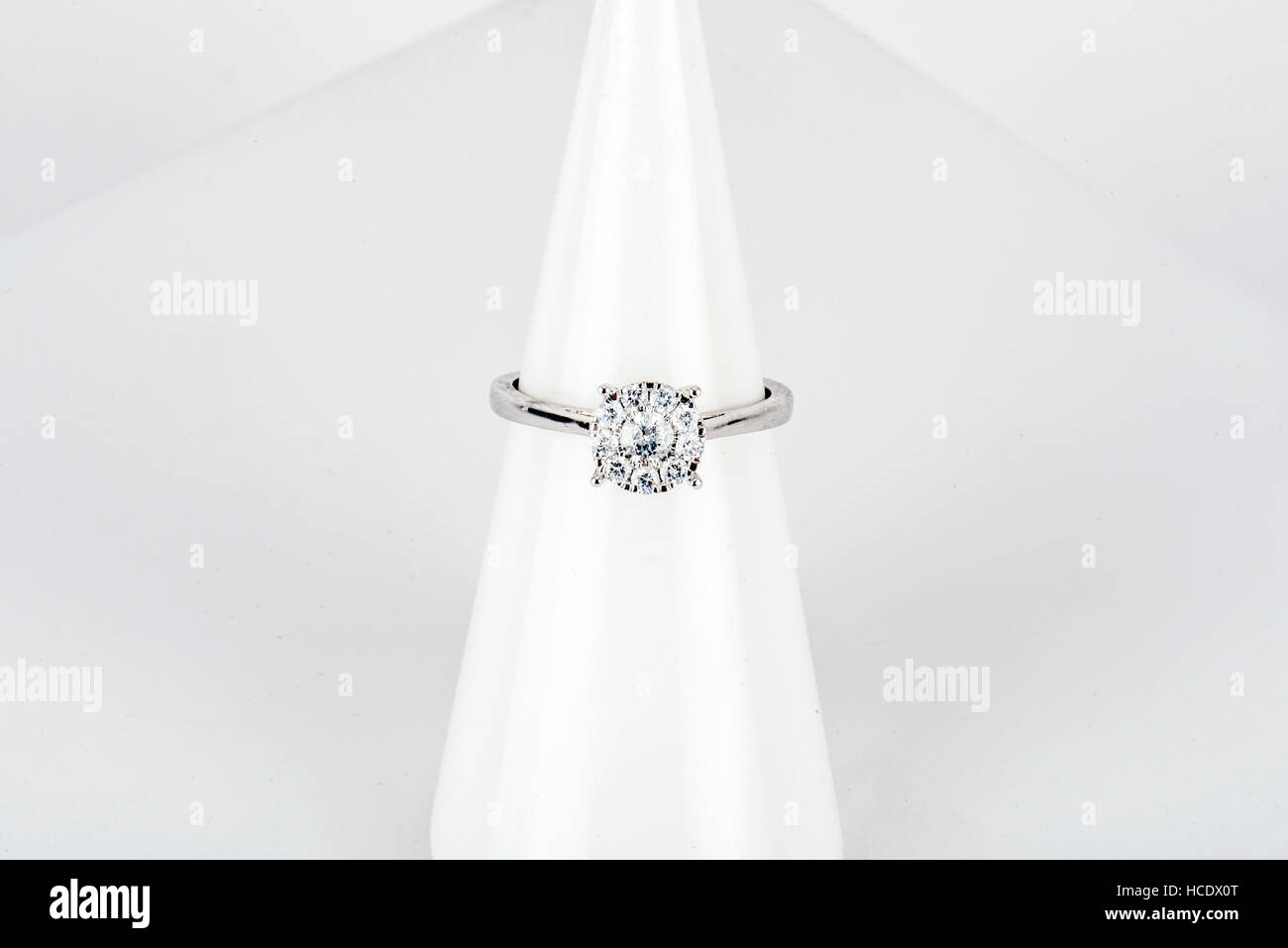 Diamond ring with gold and silver and precious stones. Shot standing up ...