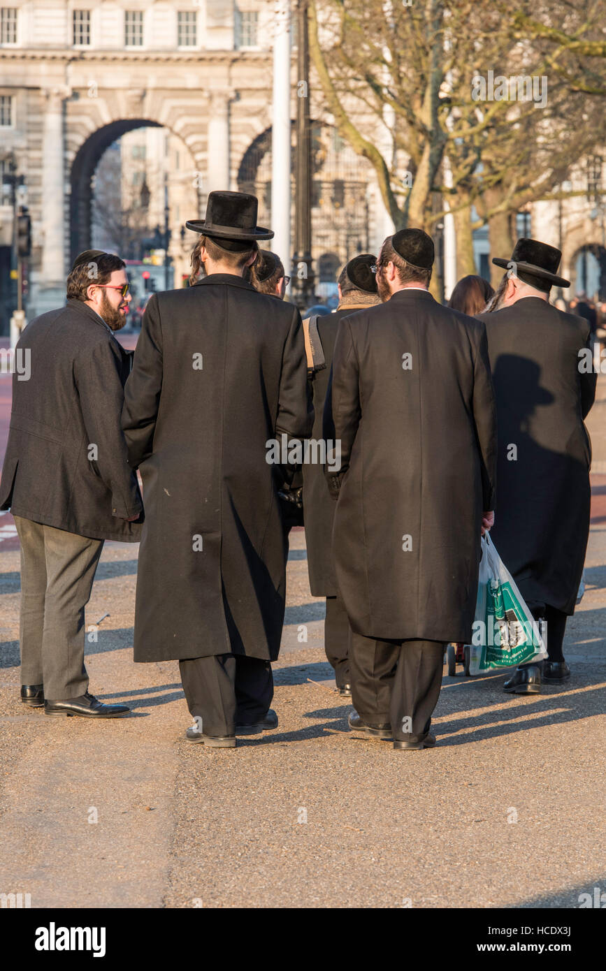 Jewish men in traditional outfits walking along The Mall in London ...