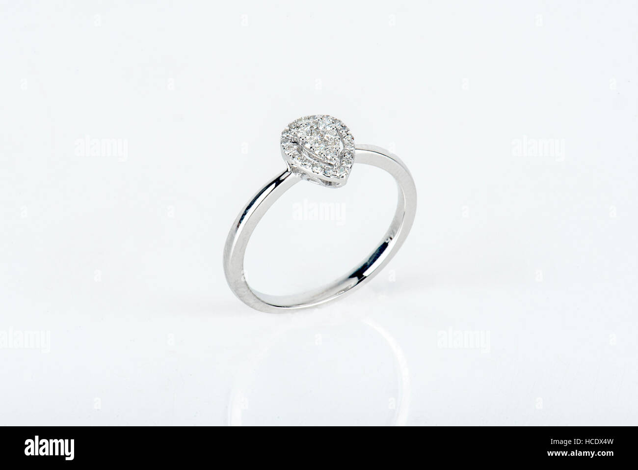 Diamond ring with gold and silver and precious stones. Shot standing up ...
