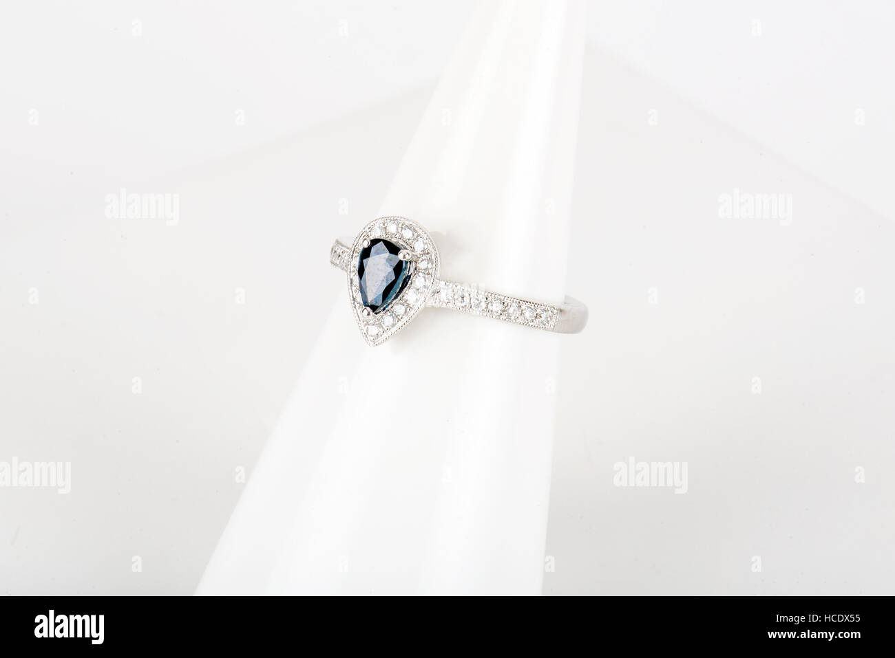 Diamond ring with gold and silver and precious stones. Shot standing up ...