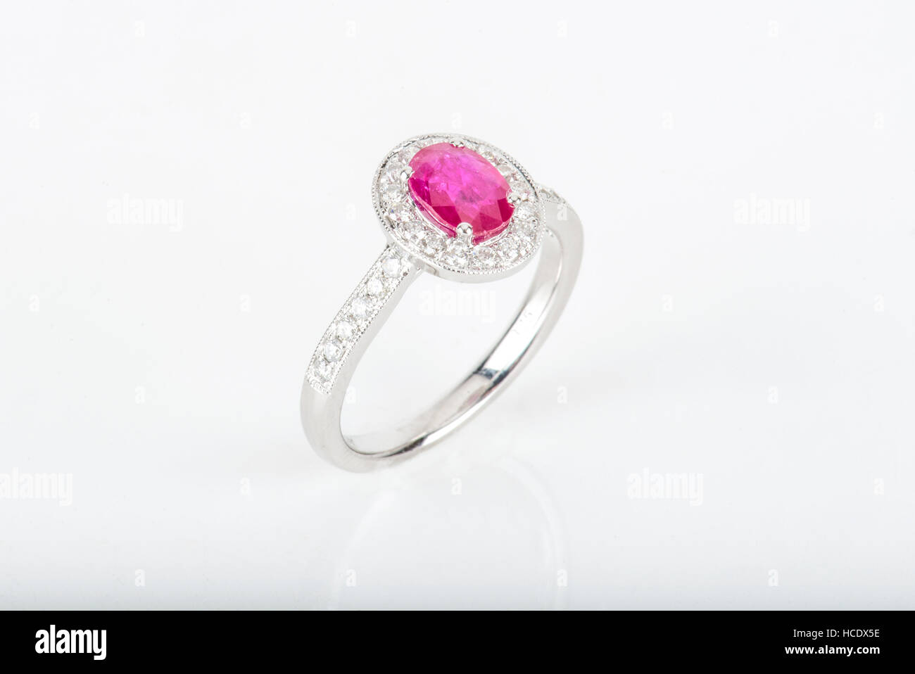 Diamond ring with gold and silver and precious stones. Shot standing up ...