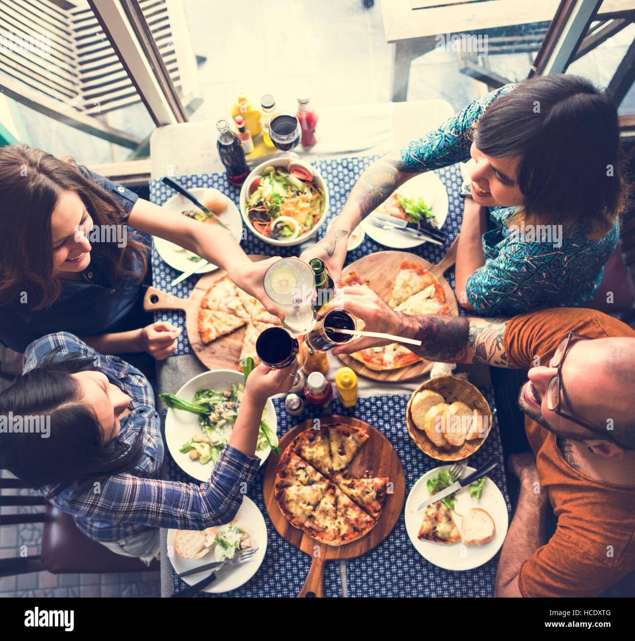 Friends Eating Pizza Party Together Concept Stock Photo - Alamy
