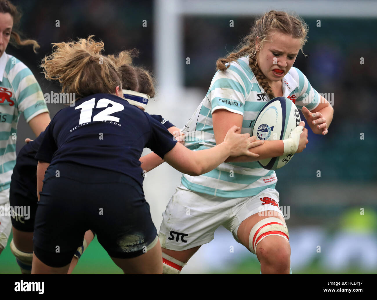 Oxford's Hester Odgers and Helena Copley tackle Cambridge's Emily Pratt ...