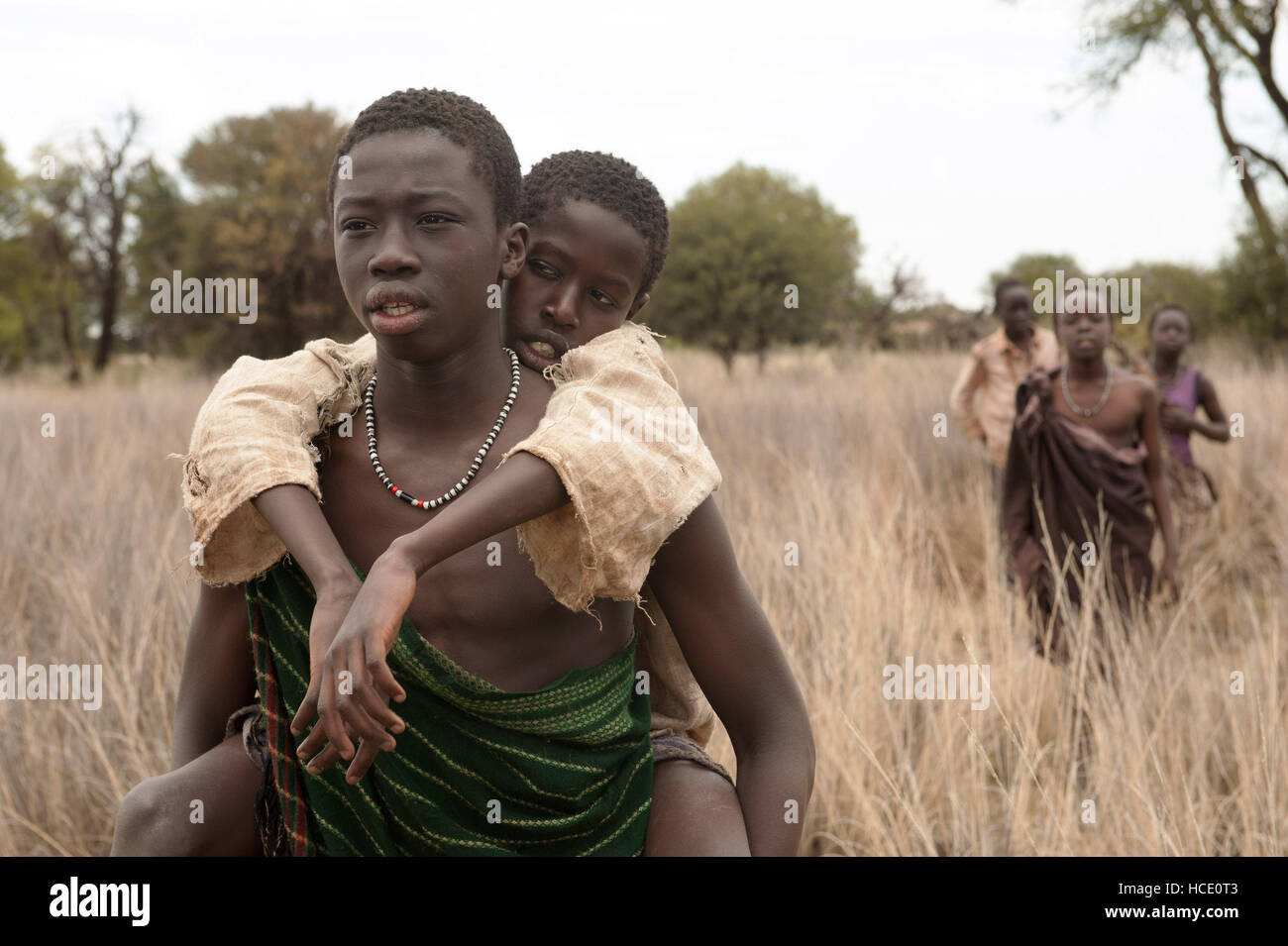 THE GOOD LIE, first two from left: Okwar Jale, Kon Akoue Auok, 2014. ph ...