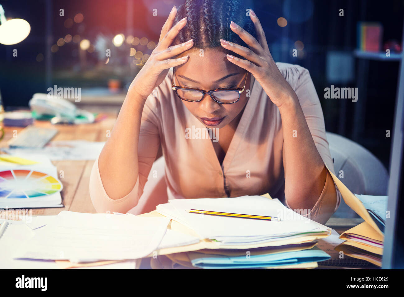 Woman stressed sitting desk hi-res stock photography and images - Alamy