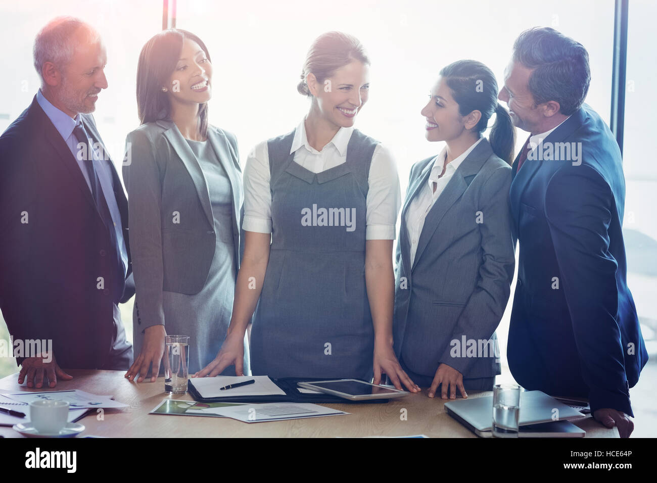 Business people interacting in hi-res stock photography and images - Alamy