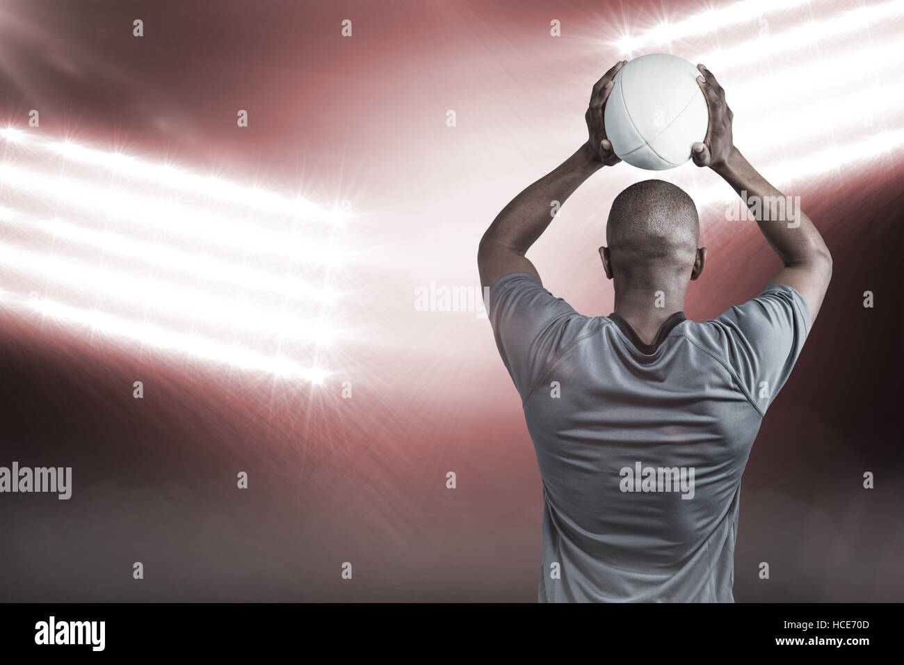 Composite image of rear view of athlete throwing rugby ball 3D Stock ...