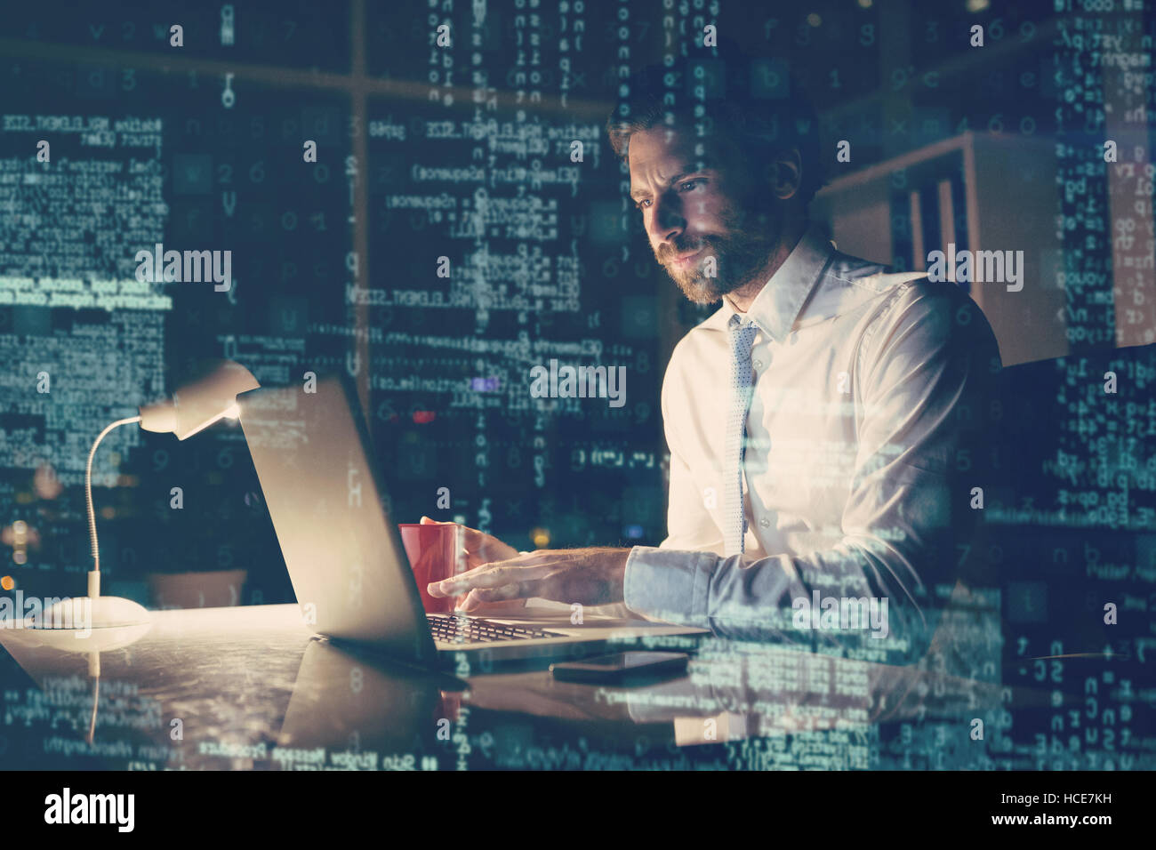 Using laptop at night hi-res stock photography and images - Alamy