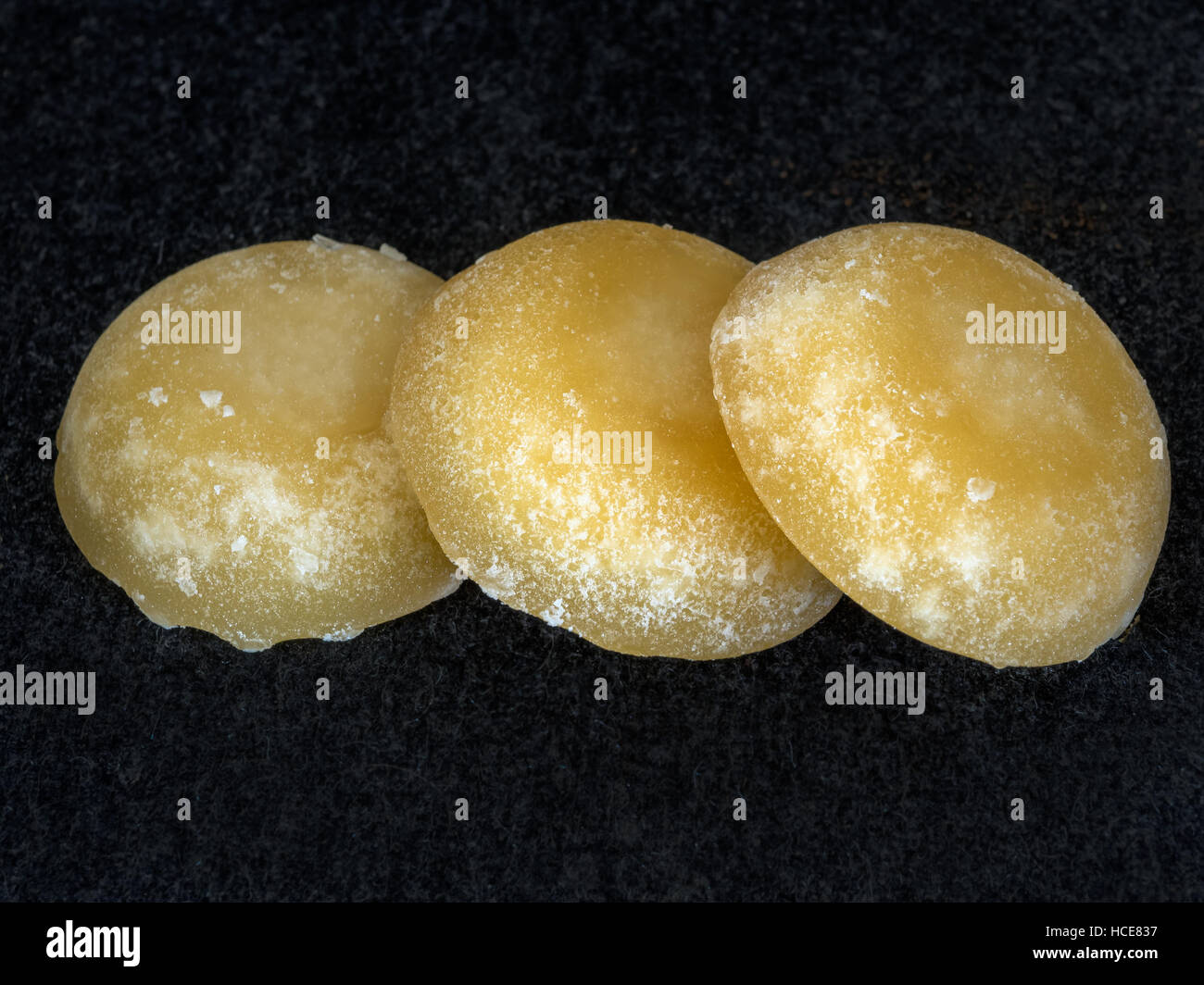 Three pods of sweet palm sugar Stock Photo - Alamy