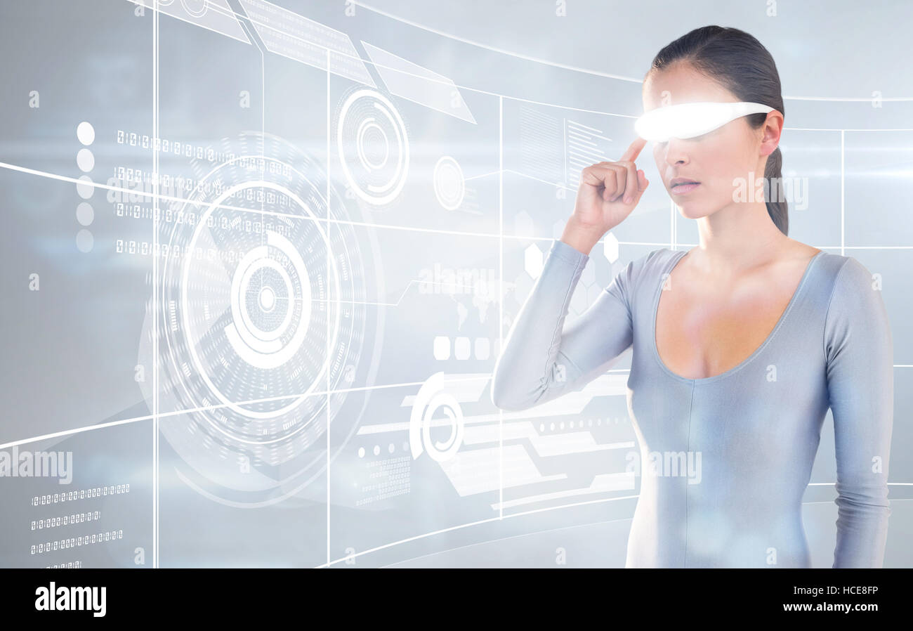Composite image of young woman using virtual video glasses Stock Photo ...