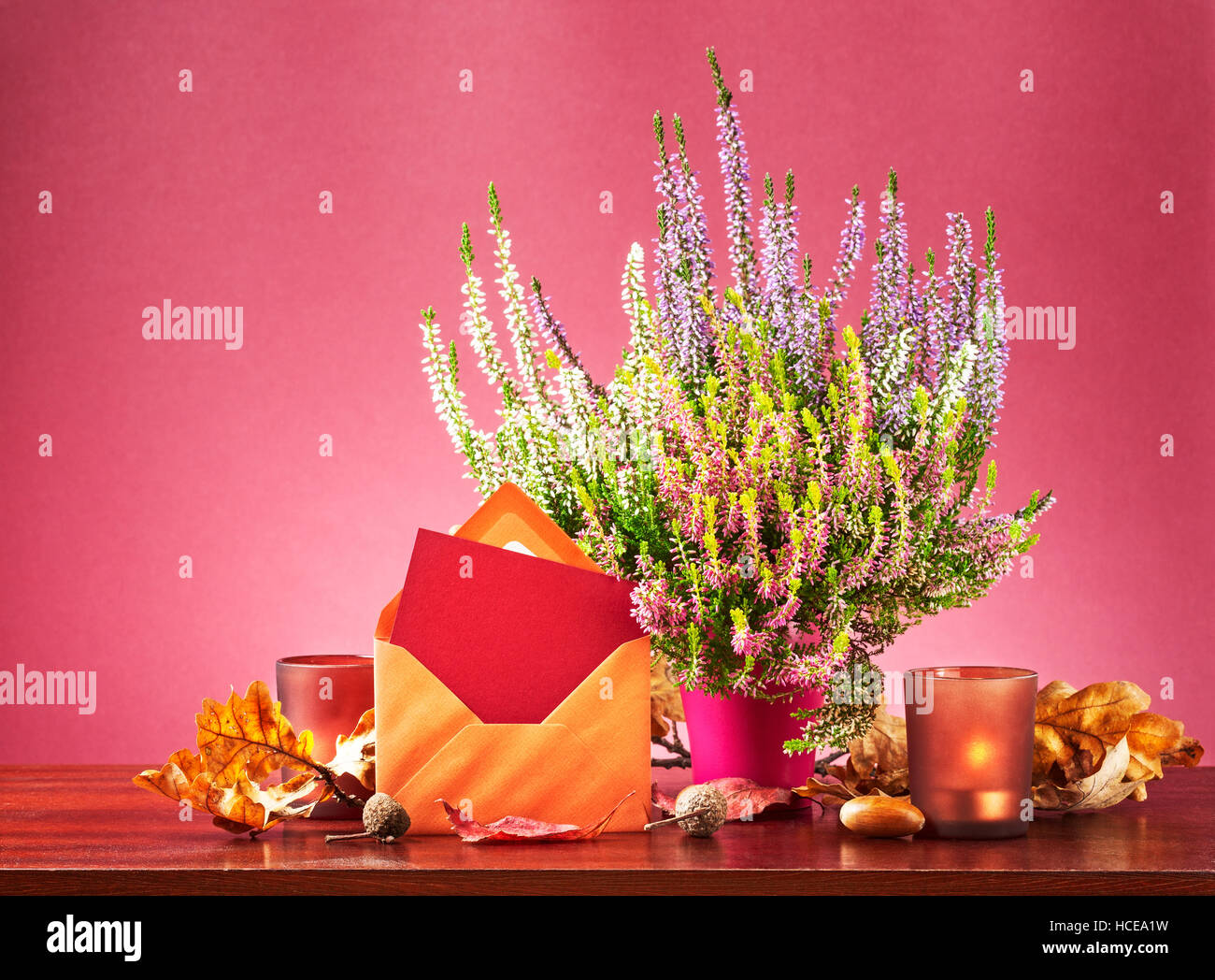 Autumn mail. Still life with greeting card, envelope, heather flowers ...