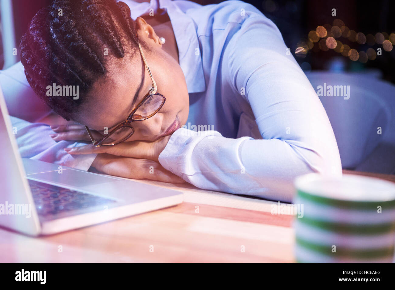 Sleeping at working desk hi-res stock photography and images - Alamy